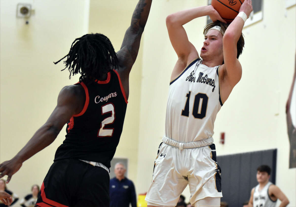 Jacob Huber scored 25 points to lead Father McGivney to win over SIUE