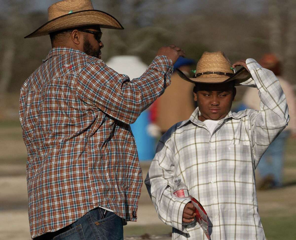 Houston rodeo trail ride: Riders reach downtown Houston rodeo parade