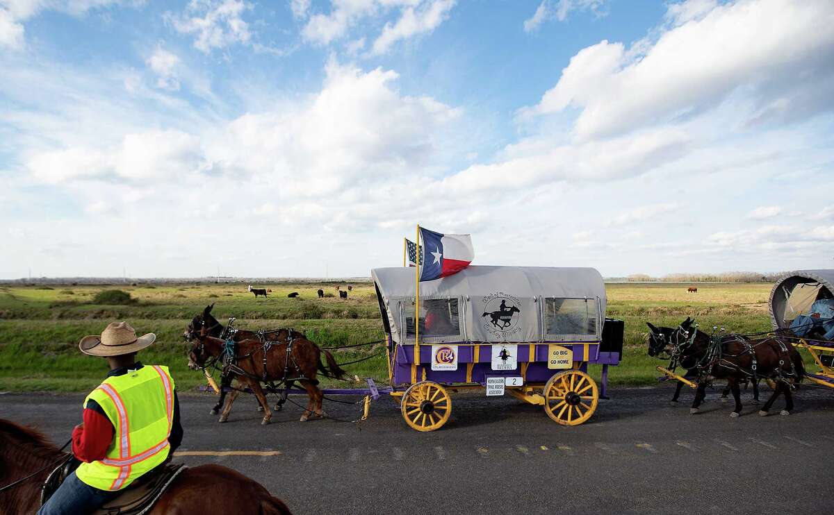 Houston rodeo trail ride: Riders reach downtown Houston rodeo parade