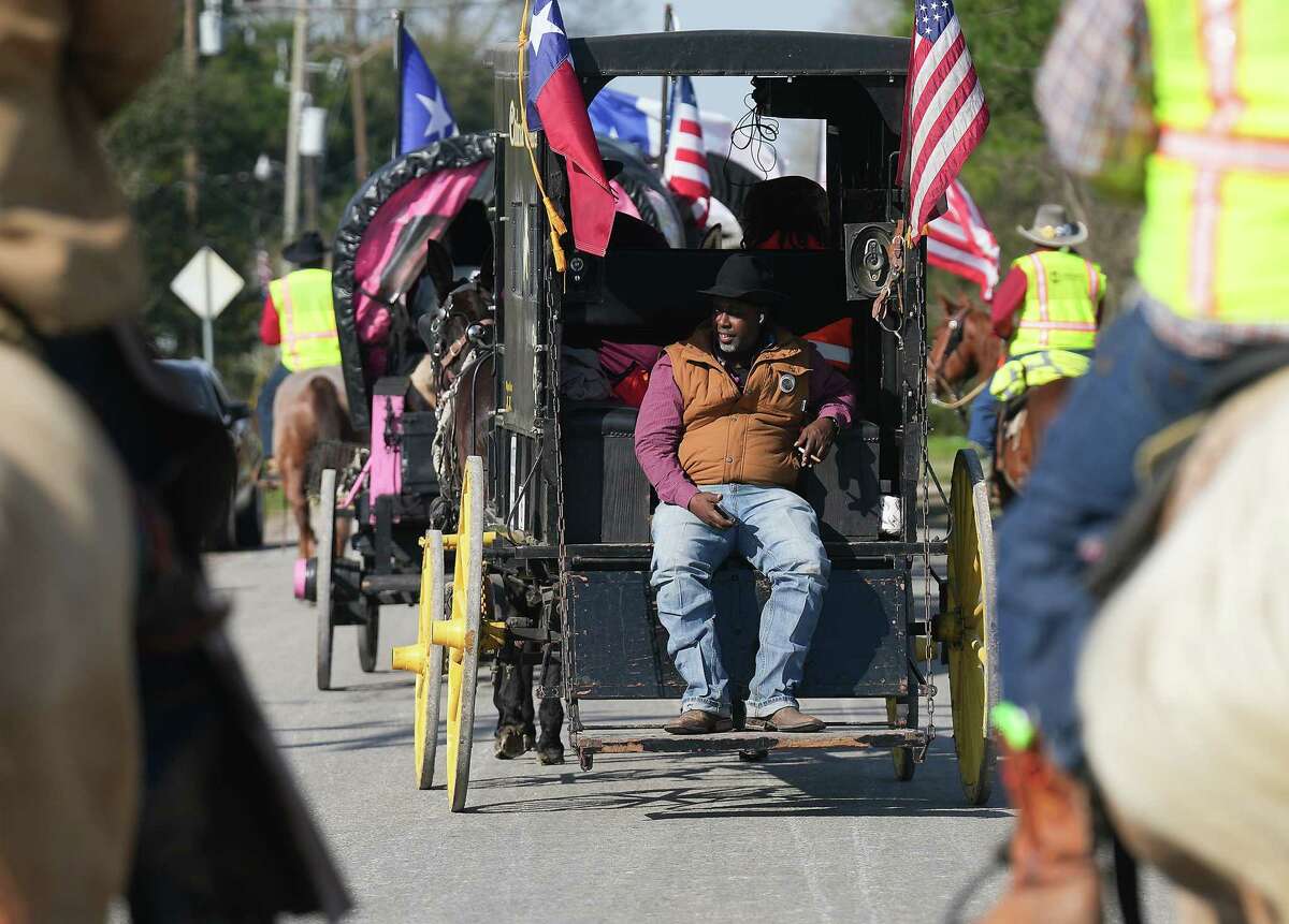 Houston rodeo trail ride: Riders reach downtown Houston rodeo parade