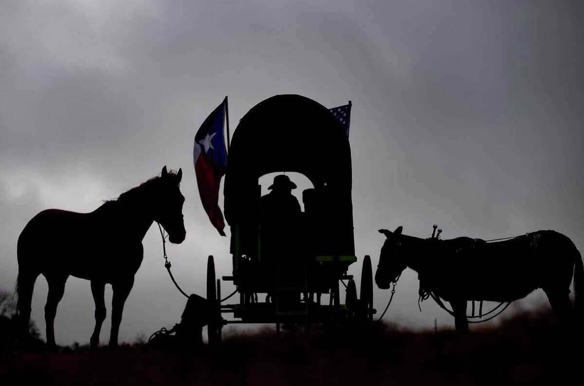 Houston rodeo trail ride: Riders reach downtown Houston rodeo parade