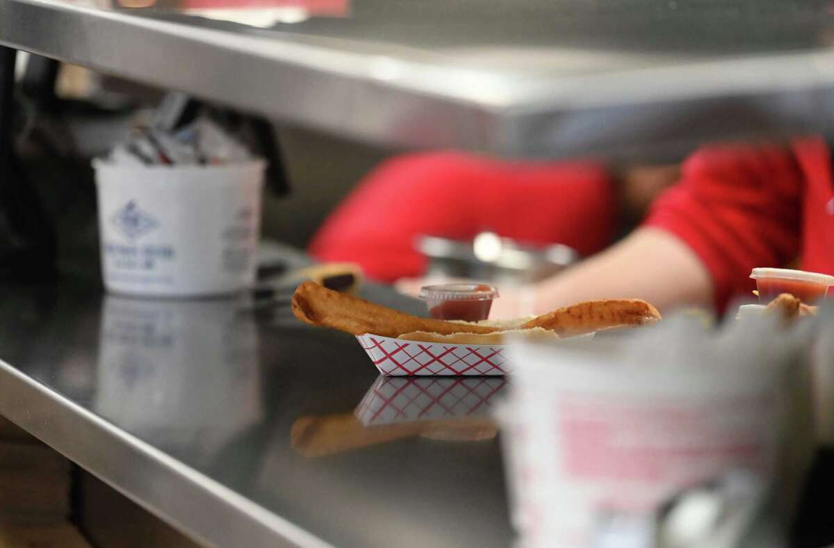 Where did Albany's signature fish fry come from?