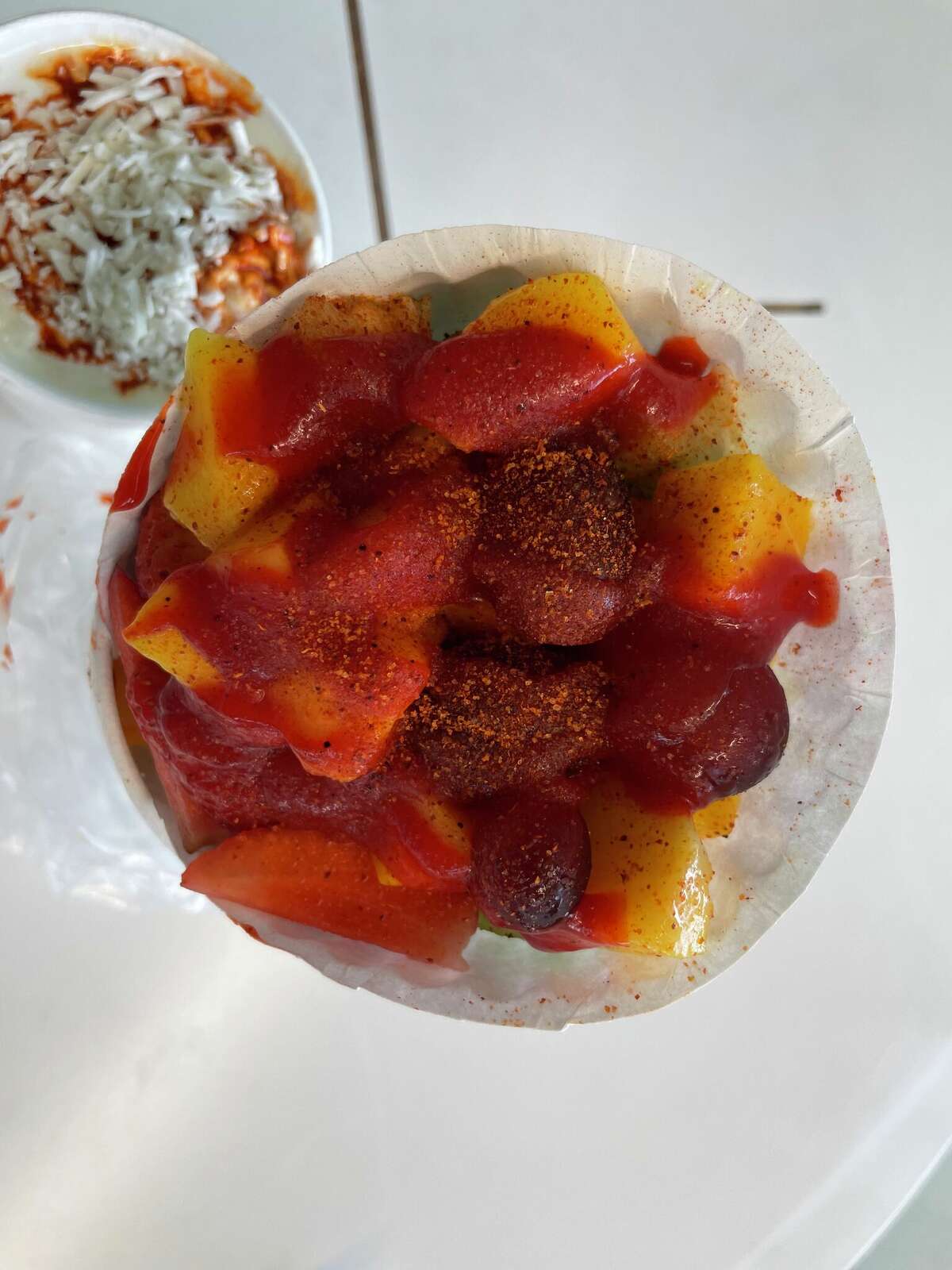 Hackberry Street lined with neighborhood bars, sweets and iconic eats