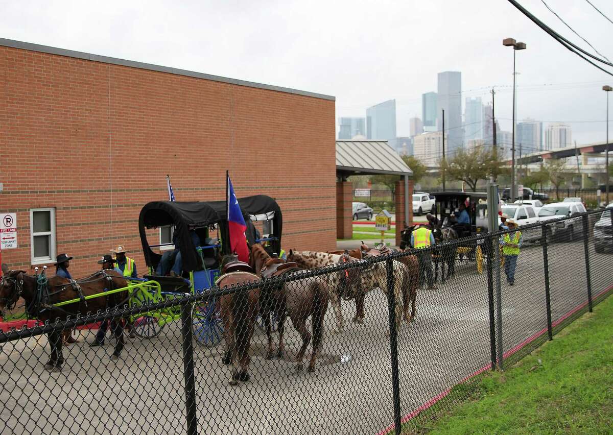 Houston rodeo trail ride: Riders reach downtown Houston rodeo parade