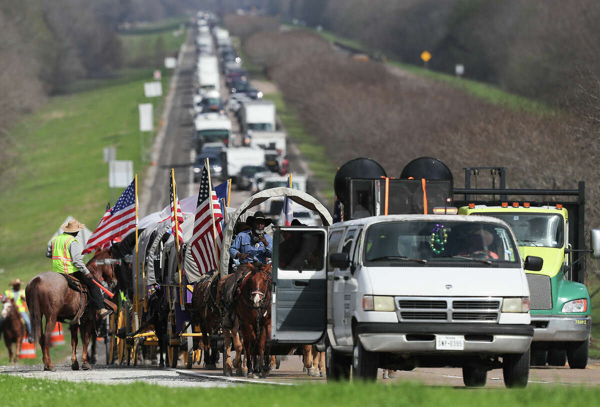 Houston rodeo trail ride: Riders reach downtown Houston rodeo parade