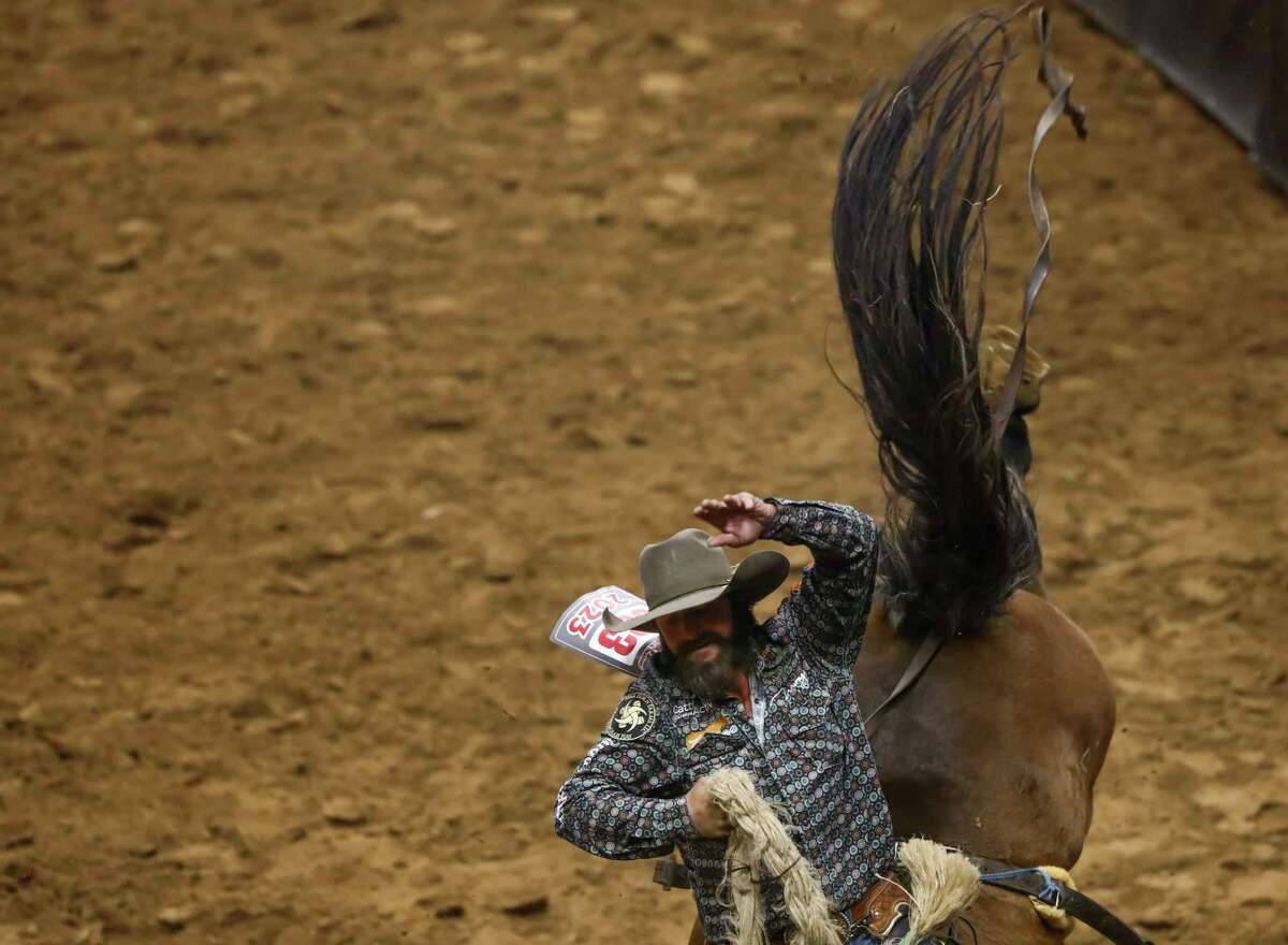 Tall in the saddle: Stetson Wright wins saddle bronc competition at San ...