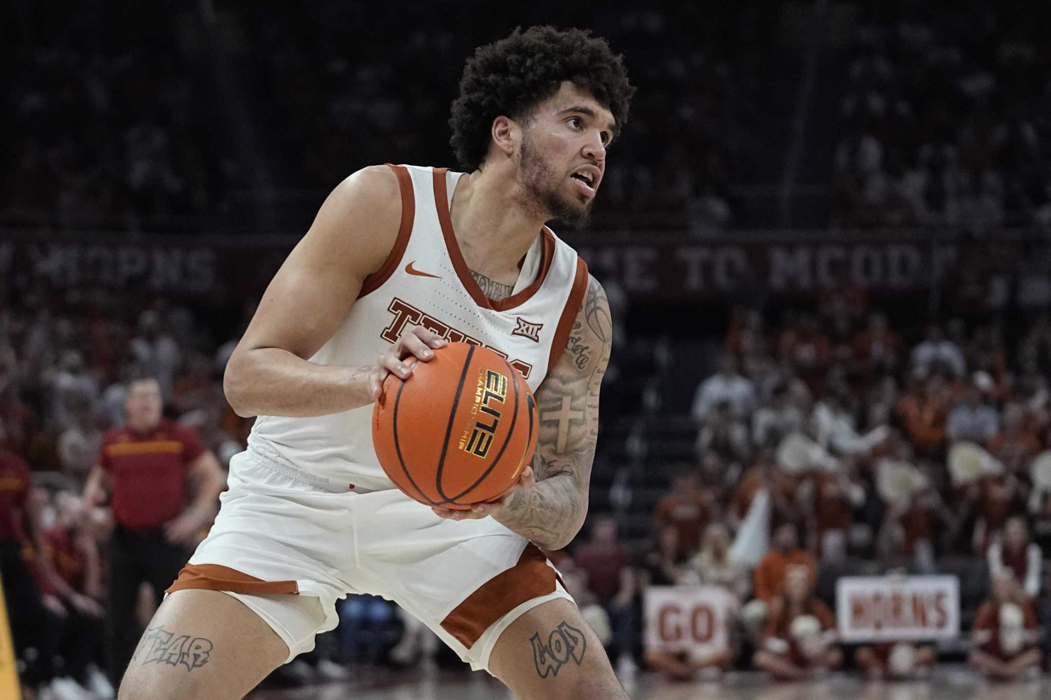 Timmy Allen content with being Longhorns’ man in the middle