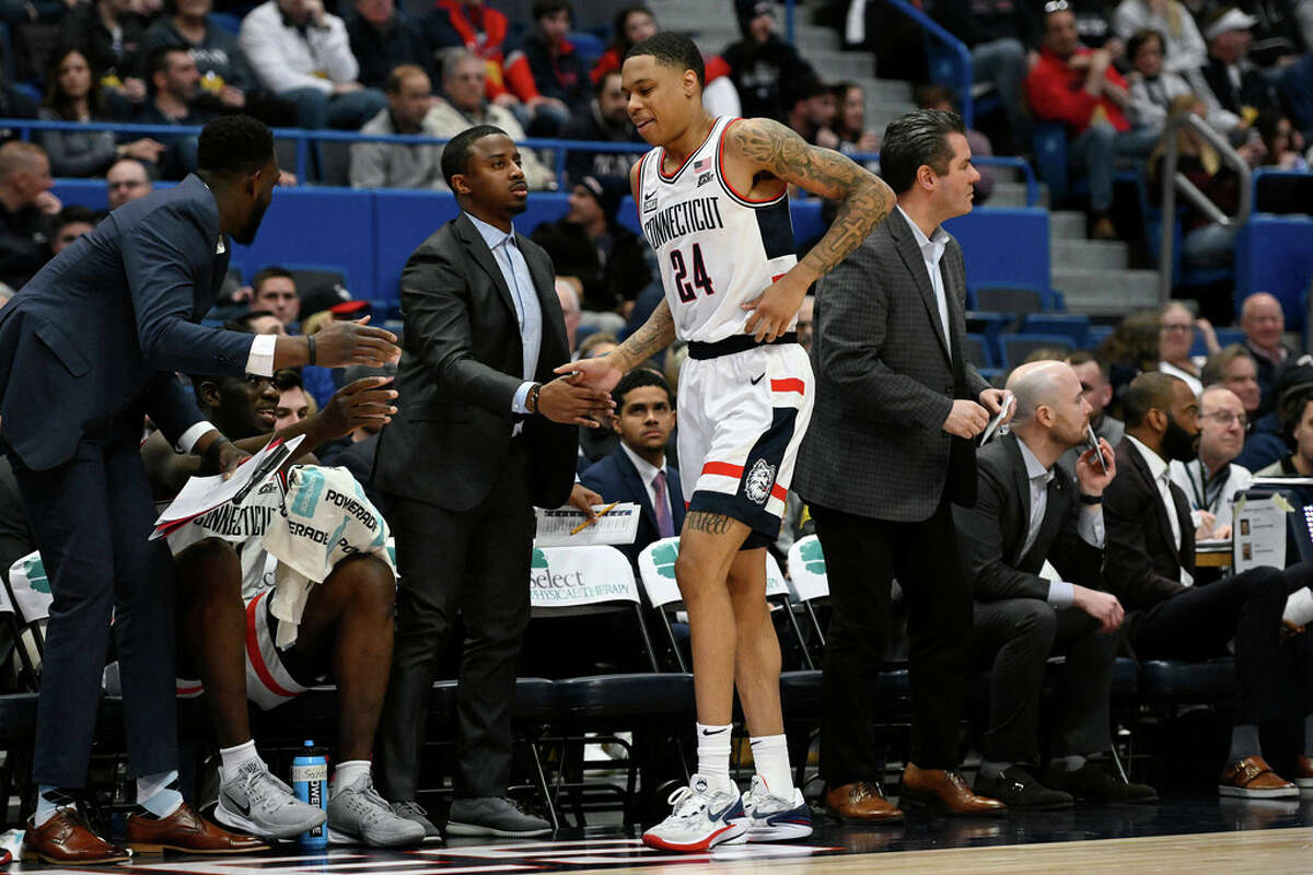 UConn men's basketball with blowout win in home finale