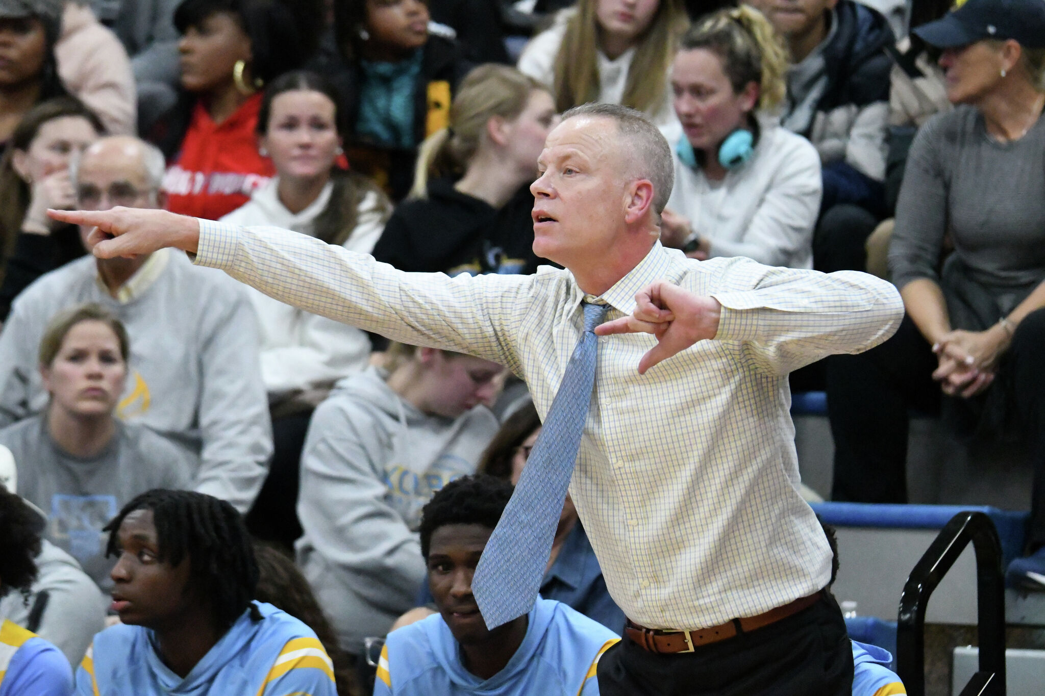 John Pfohl, Kolbe Cathedral boys basketball coach, puts family first.