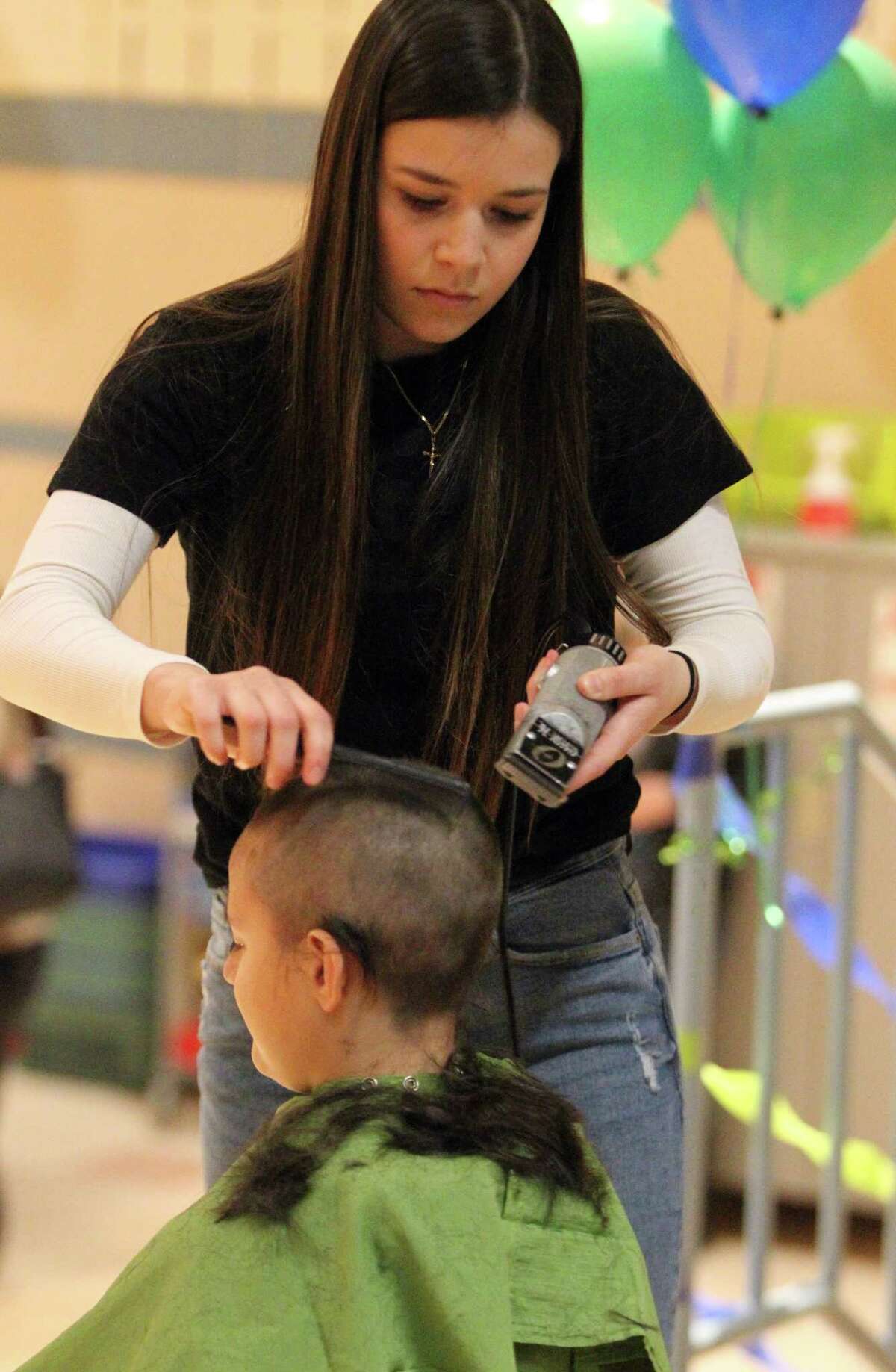 Photos: Greenwich students, teachers shave their heads for cancer