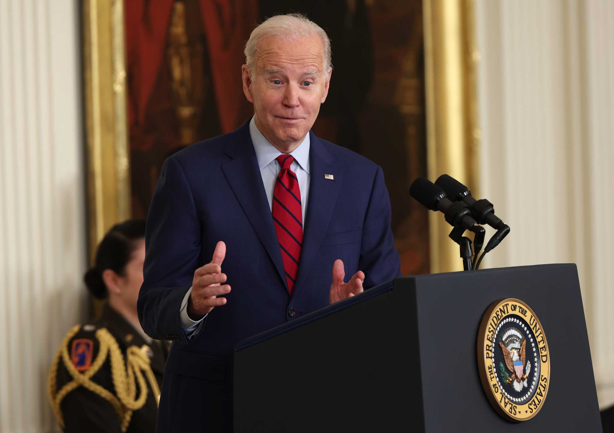 Biden signs bill ending national COVID-19 emergency a month early