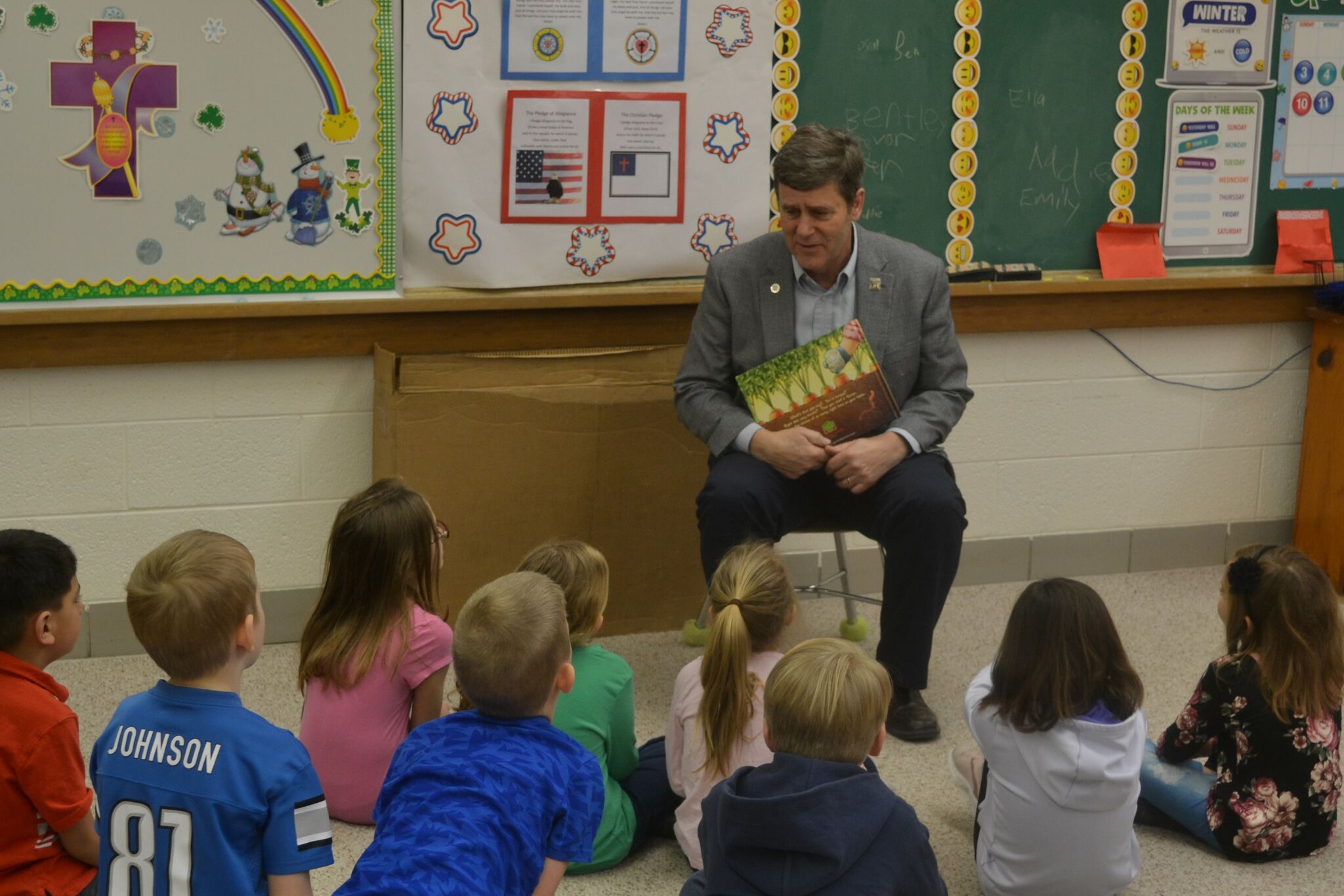 Sen. Kevin Daley reading at Caro Library on St. Patrick's Day