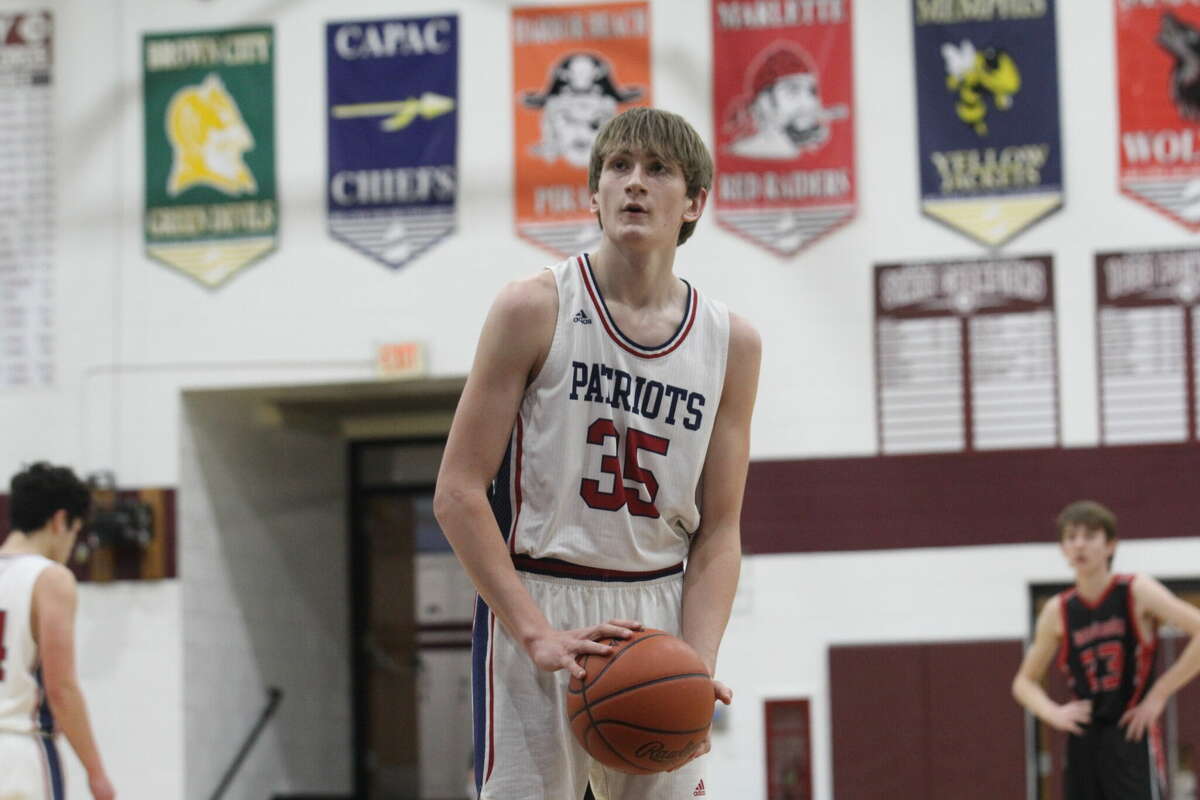 Bad Axe and Sandusky win basketball district opening games