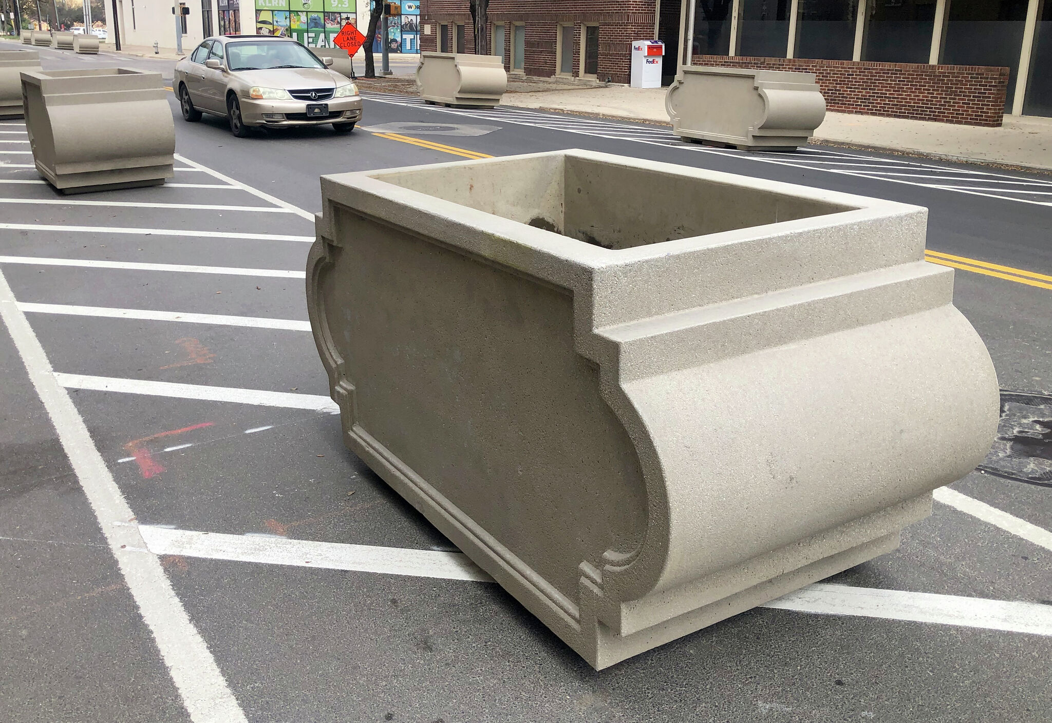 Large cement planters appear in downtown San Antonio
