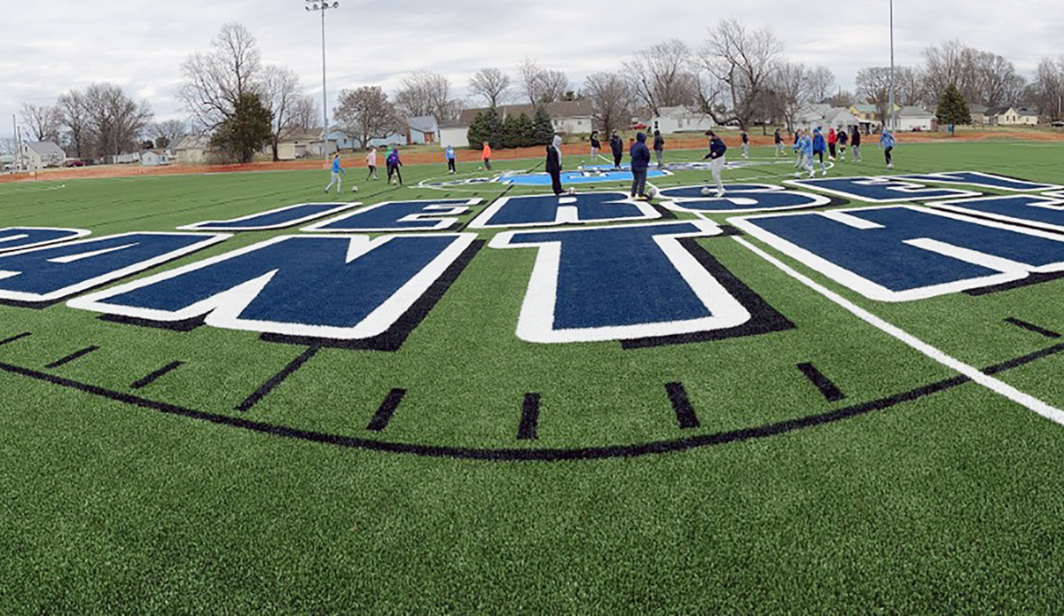 Turf work complete on soccer field, under way at football field