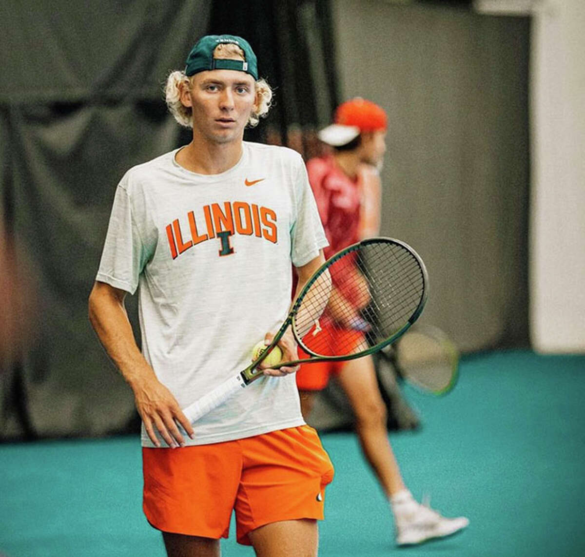 Ashton Bowers plays the world after dad played Jerseyville tennis