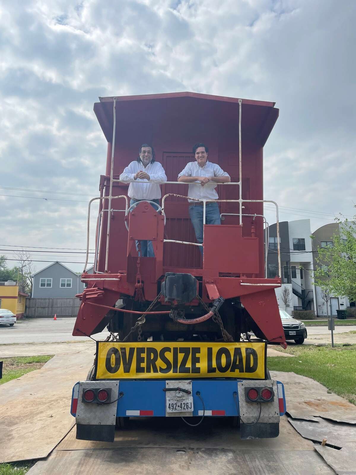 Father,son turning 1920s Eastwood building into restaurant, shops