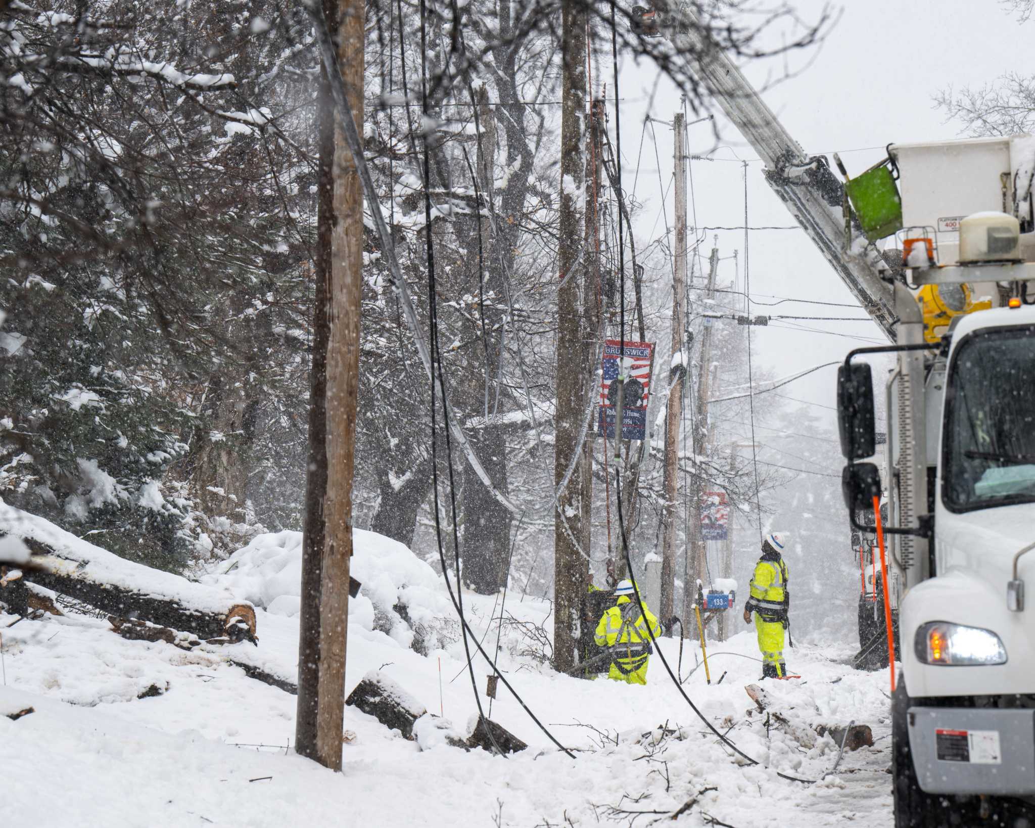 Live: Nearly 100K without power; utility crews rush to make repairs