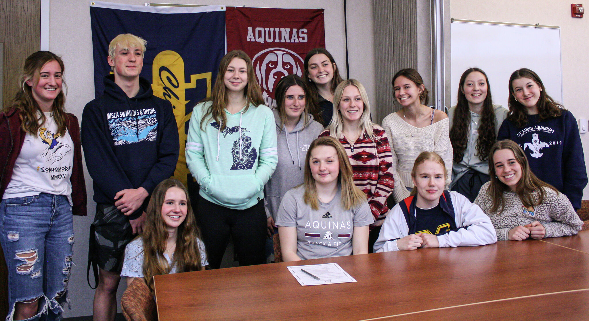 Manistee's Ashtyn Janis signs to run track at Aquinas College