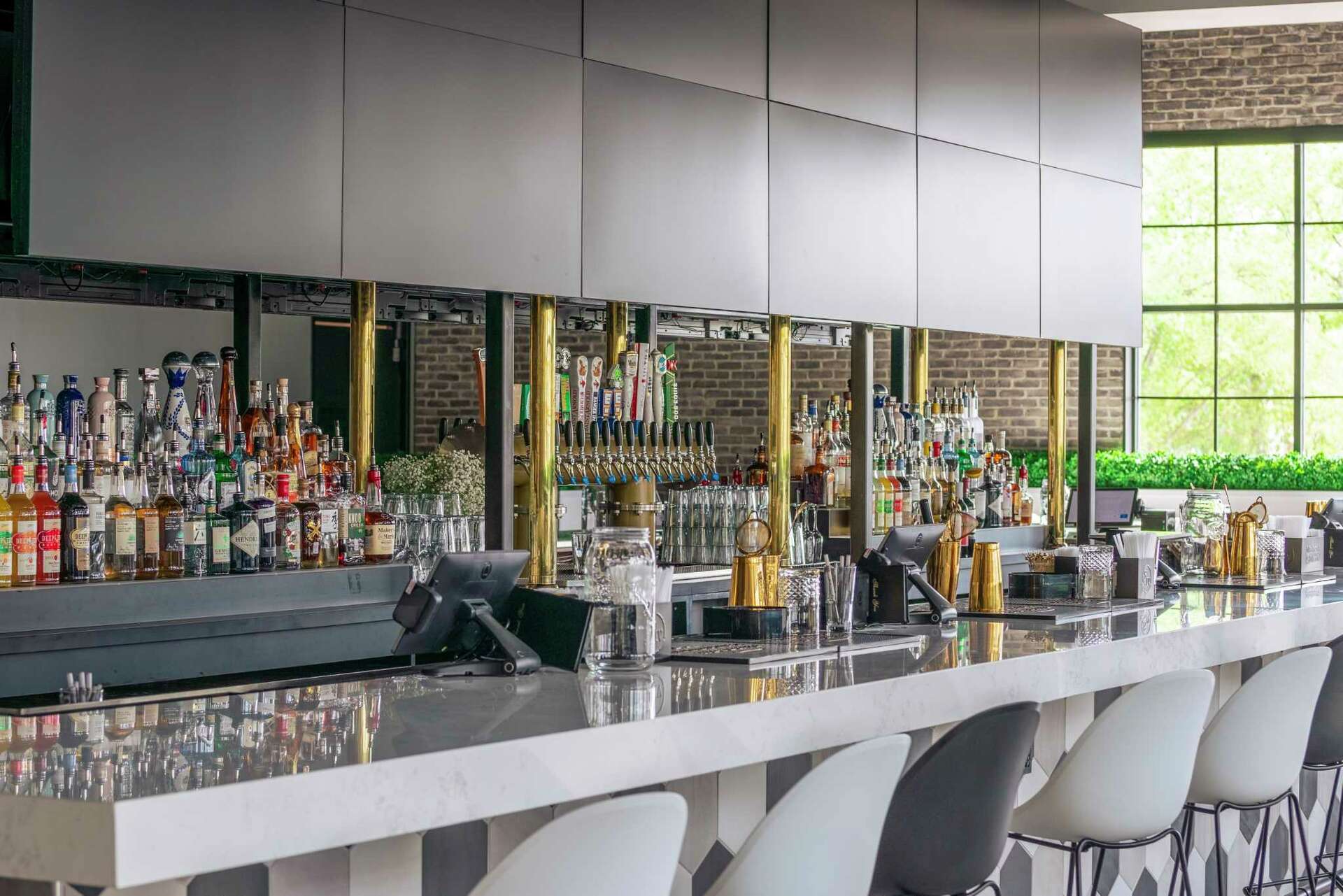 Upscale bar with posh design and cocktails on tap opens in Heights