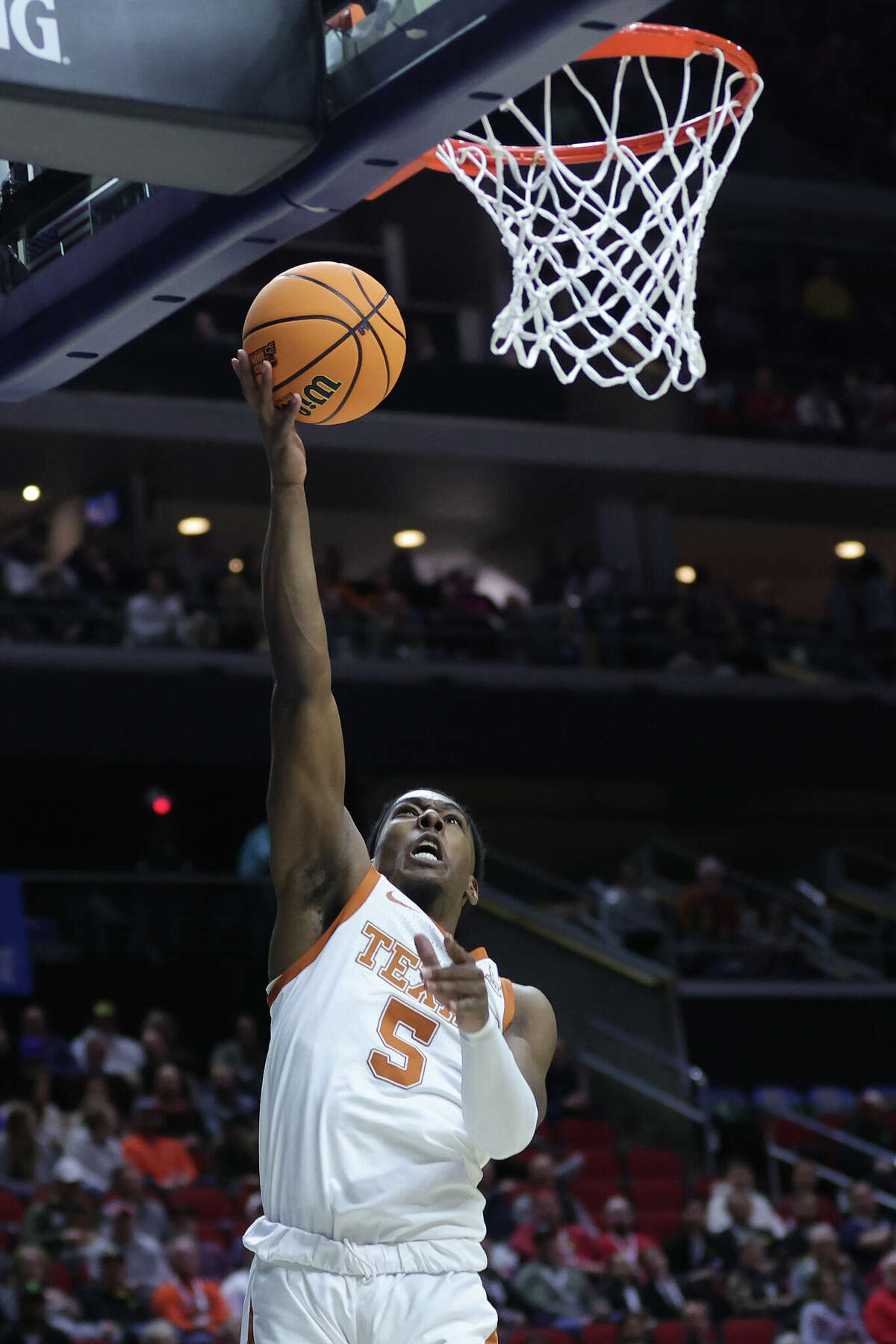 NCAA Tournament: Texas pulls away late to defeat Colgate