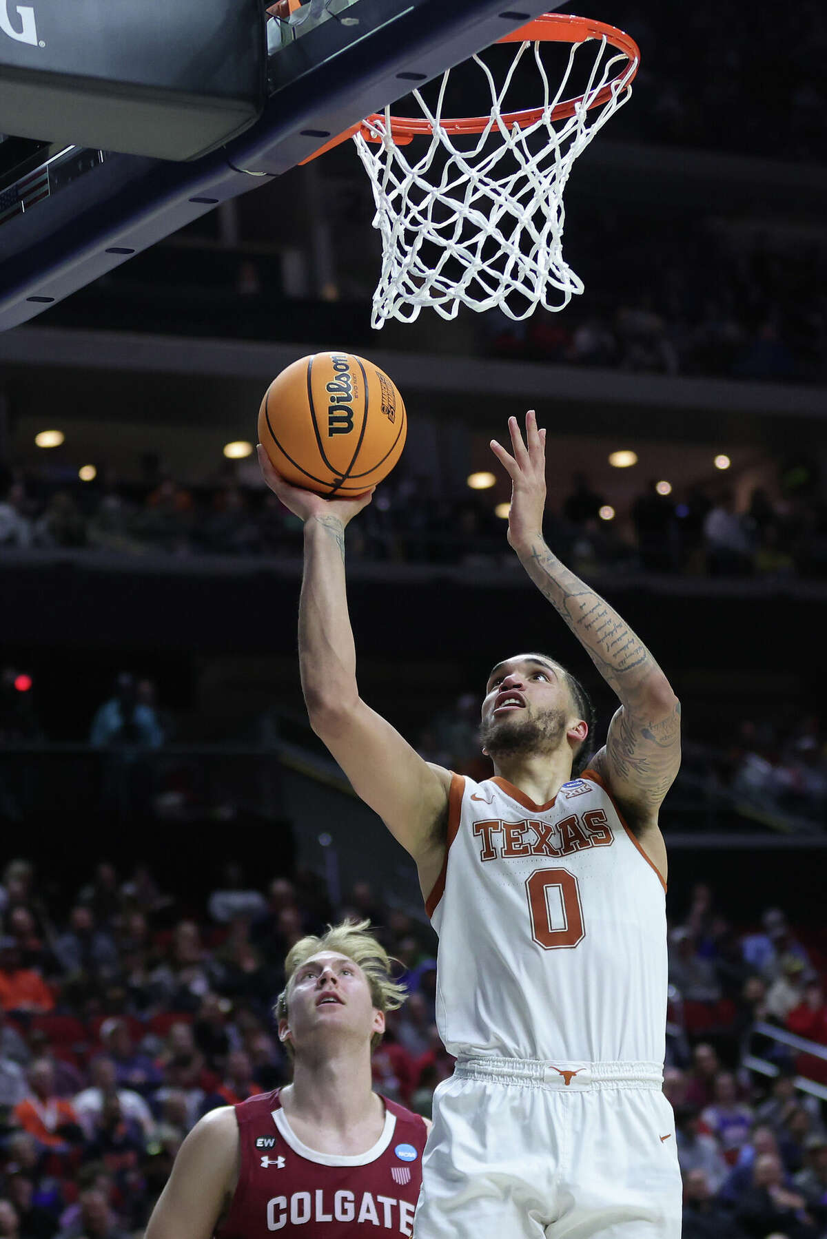 NCAA Tournament: Texas pulls away late to defeat Colgate