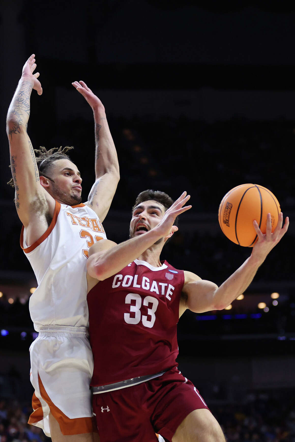 NCAA Tournament: Texas pulls away late to defeat Colgate