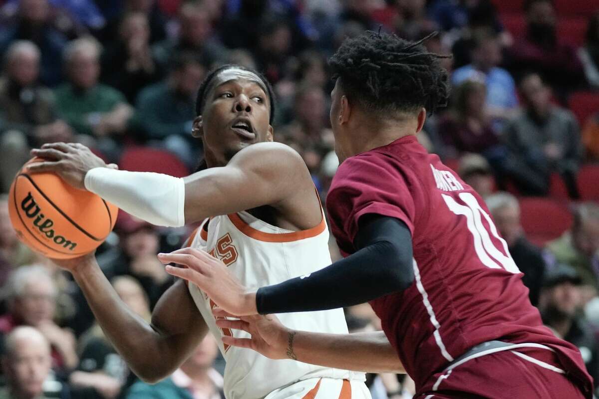NCAA Tournament: Texas pulls away late to defeat Colgate