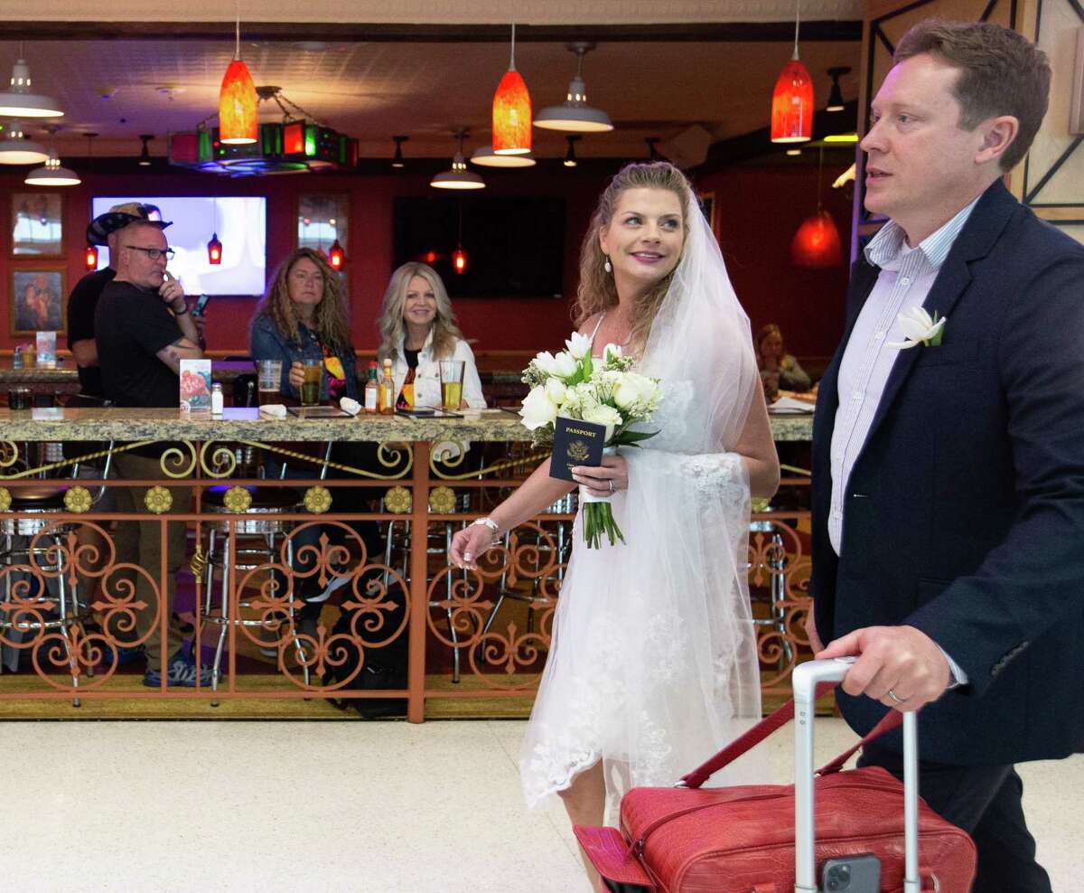 Hobby Airport wedding: Long-distance couple weds during layover