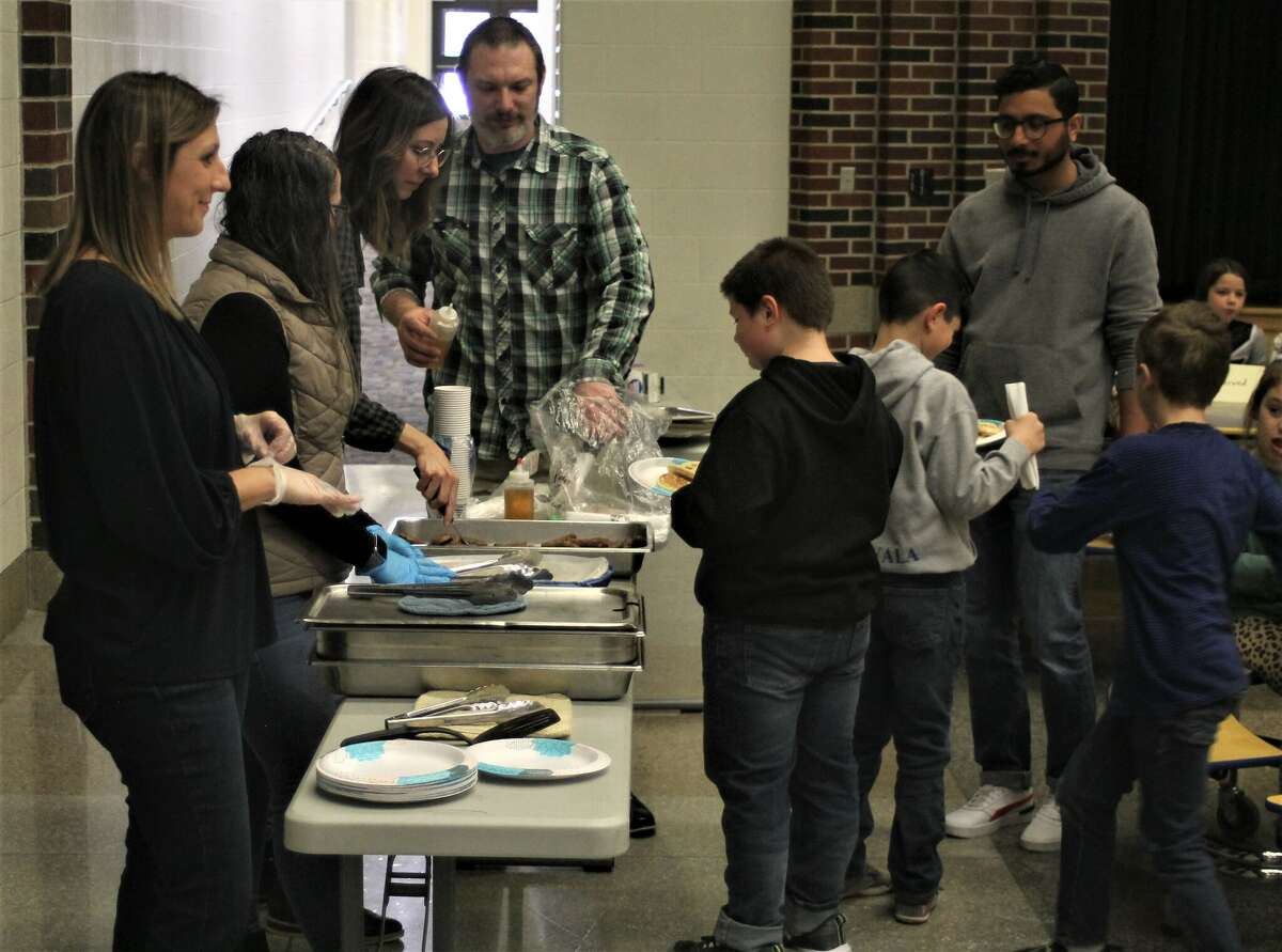 Onekama students enjoy pancakes after maple syrup project
