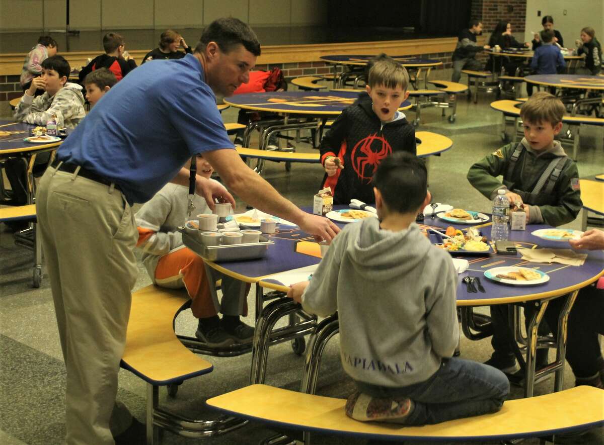 Onekama students enjoy pancakes after maple syrup project