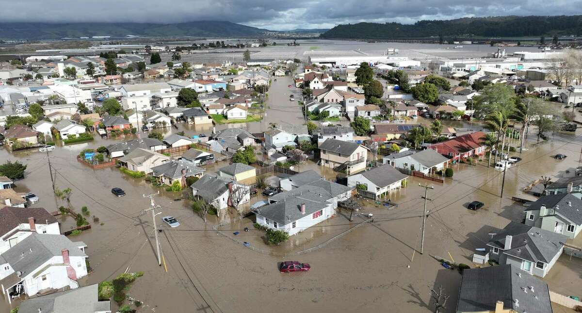 Evacuated residents return to flood-damaged Monterey County town