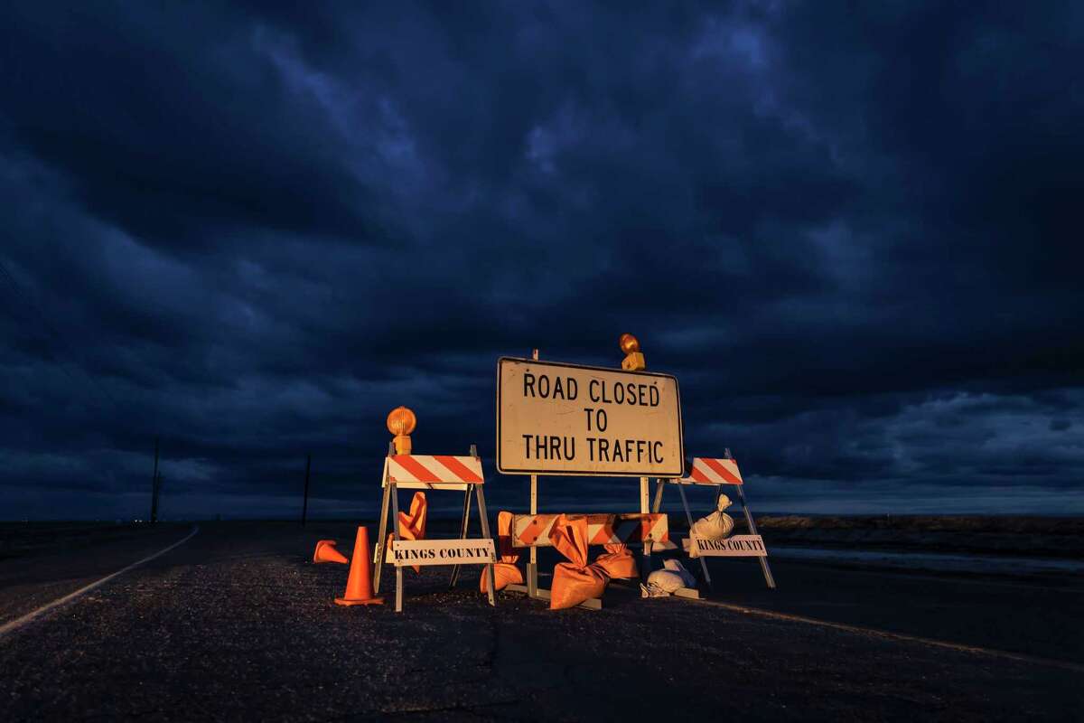 Lost California lake reemerges after storms, swamping towns and farms