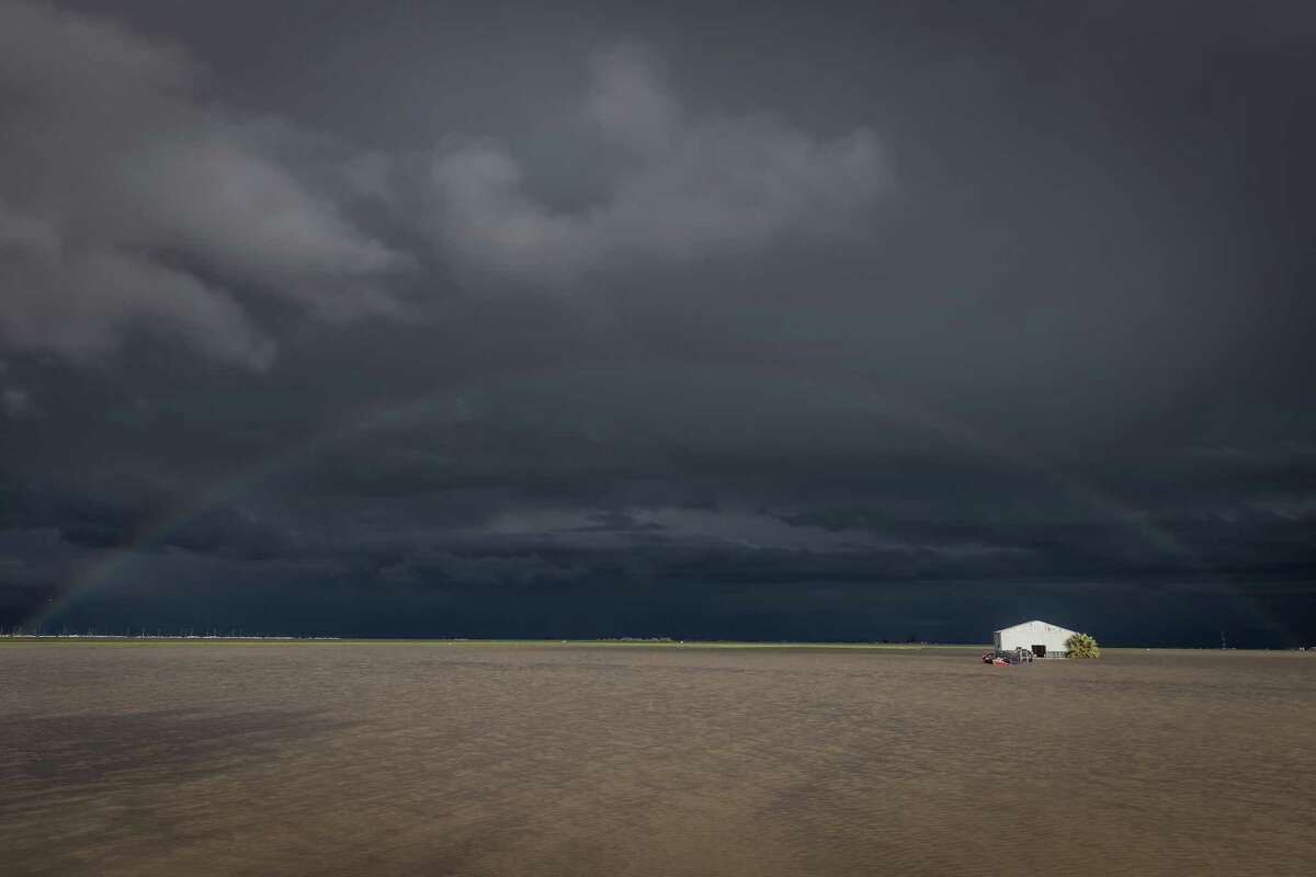 Lost California lake reemerges after storms, swamping towns and farms