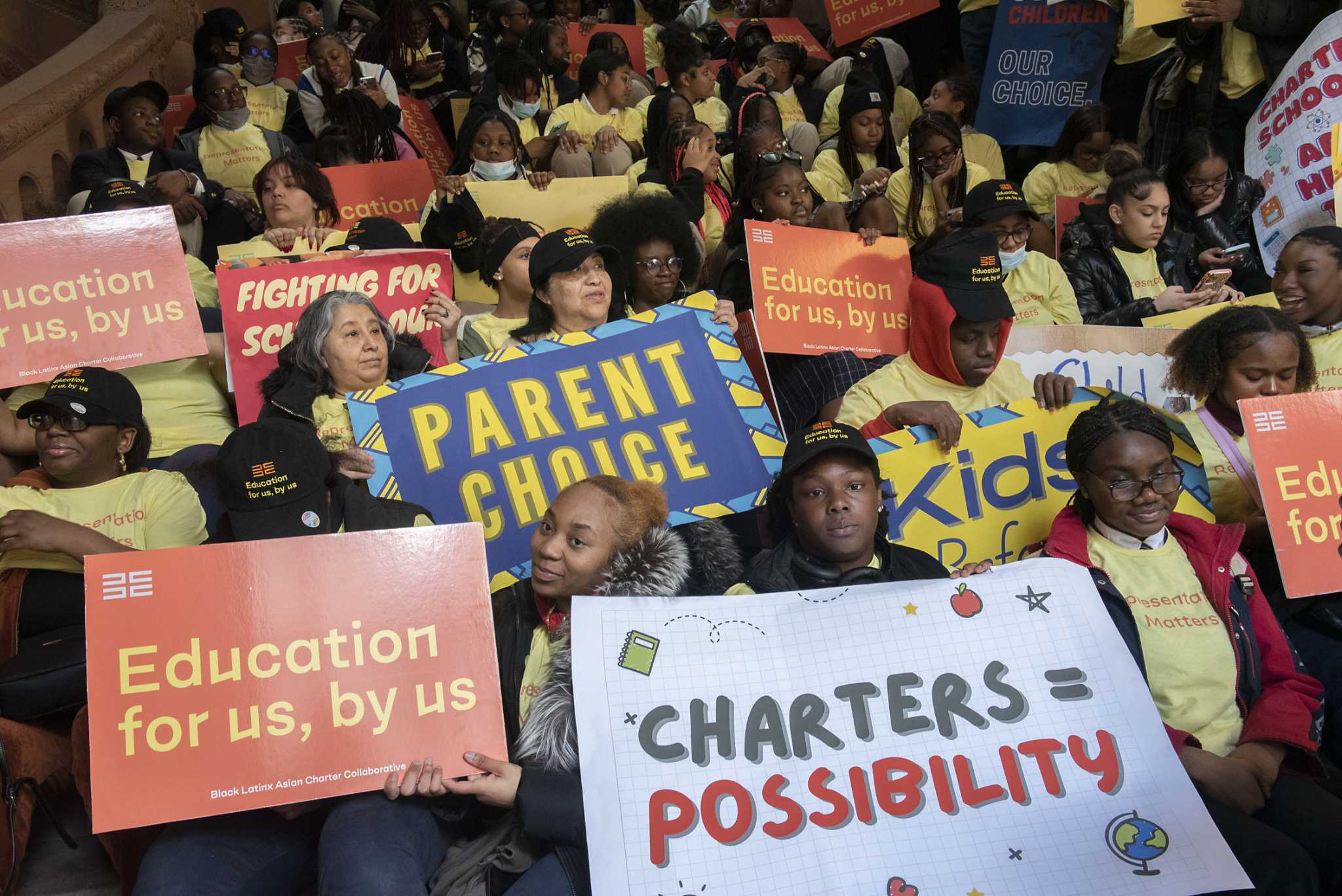 Bloomberg, Walmart heir give charter school fight $2 million