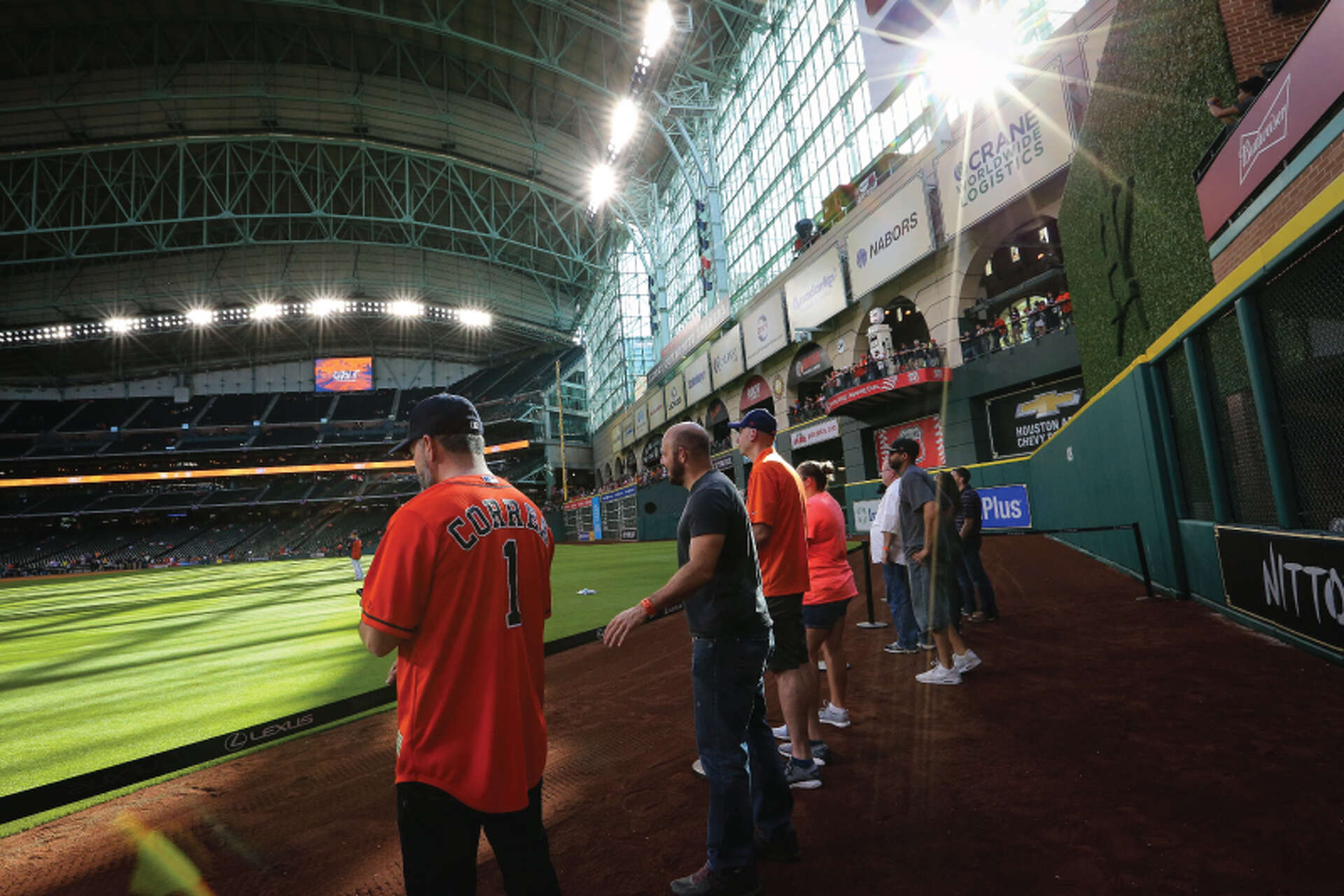 Luxury seats at Astros game have private bar, field access, chef