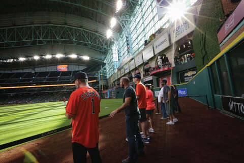 Luxury seats at Astros game have private bar, field access, chef