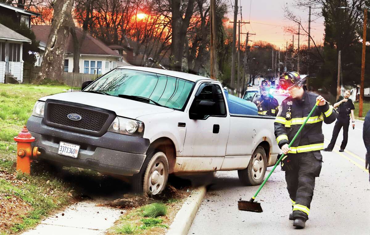 Pickup strikes Alton hydrant, utility pole on Monday morning