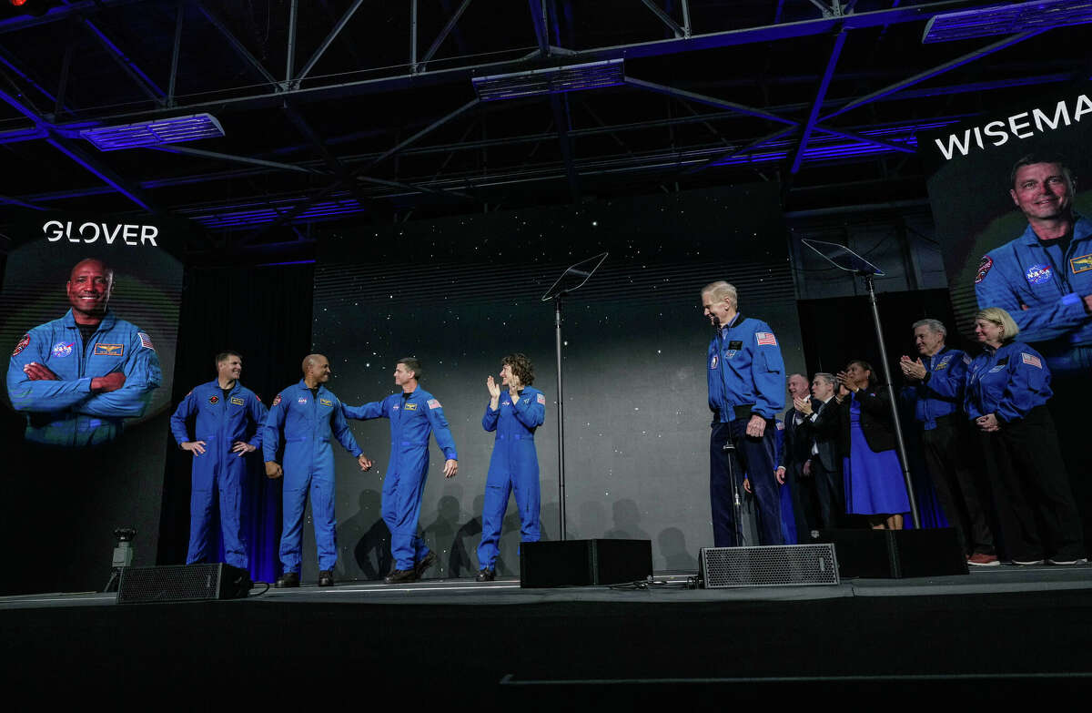 NASA names four astronauts who will circle the moon on Artemis II