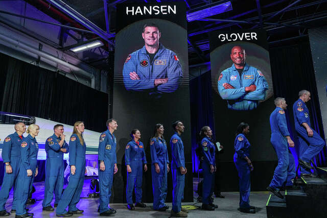 NASA names four astronauts who will circle the moon on Artemis II