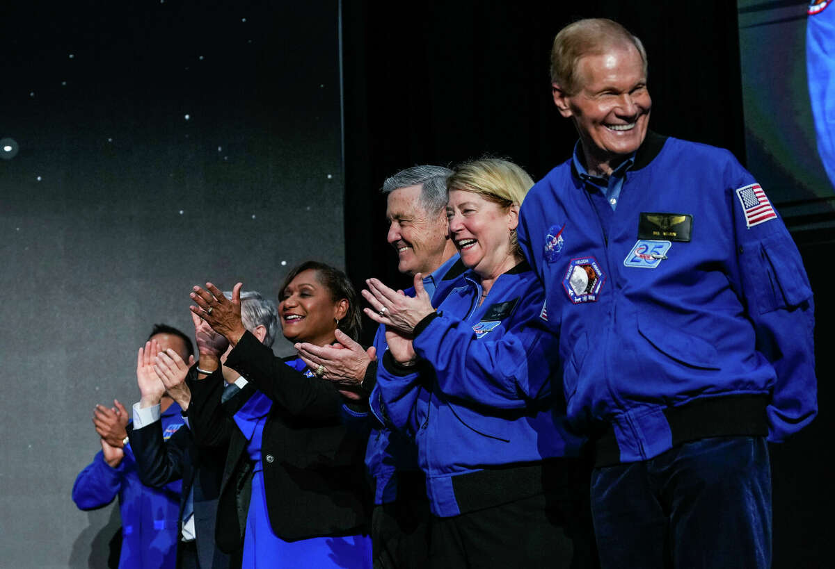NASA names four astronauts who will circle the moon on Artemis II