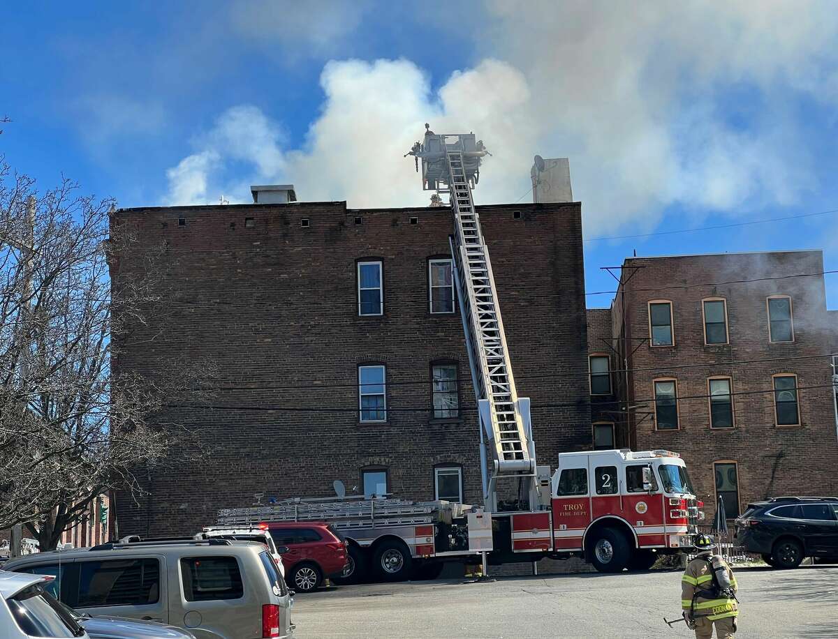 Rescuers rush to burning building on Troy's Hutton Street