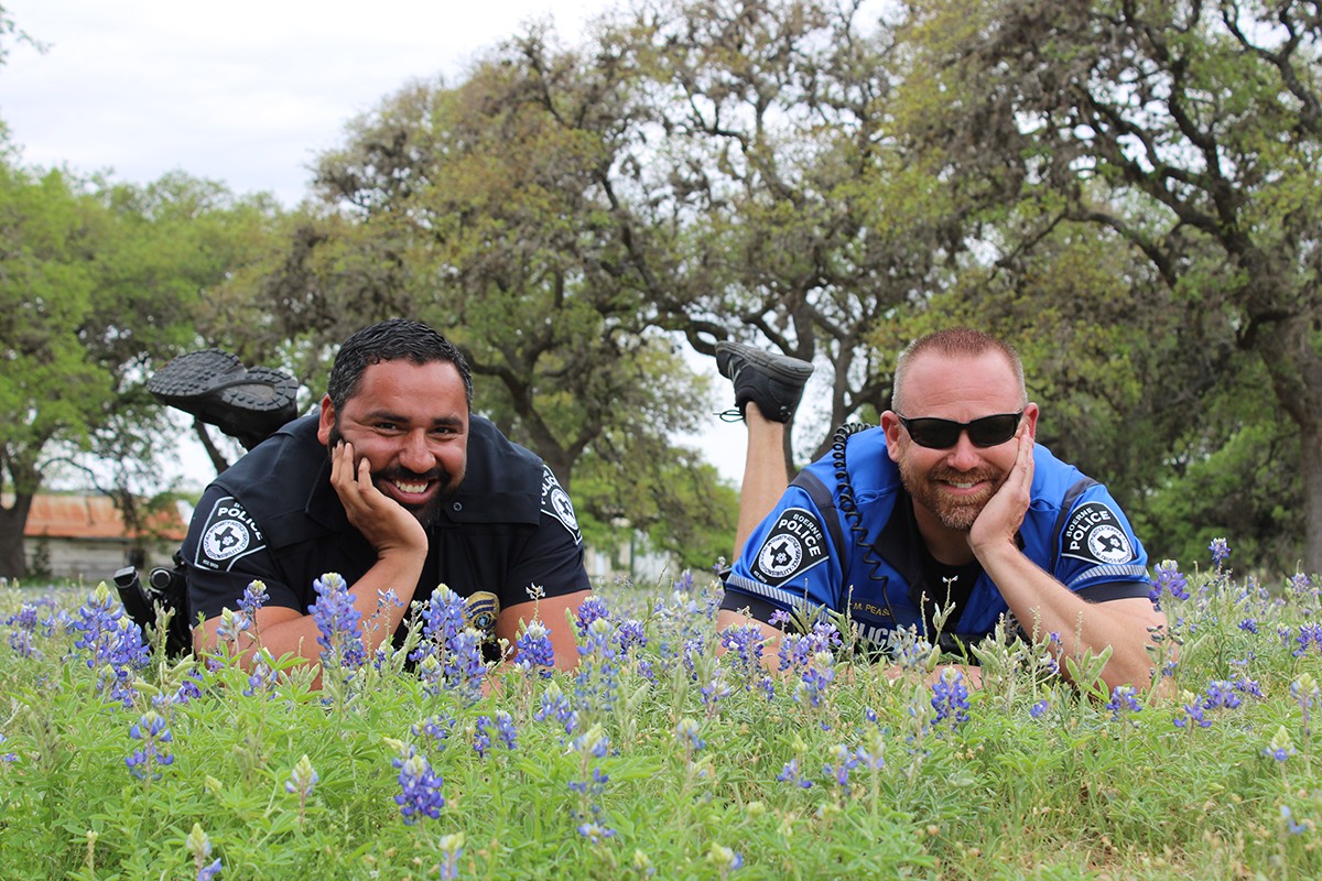 Texas law officers are taking photos of themselves with bluebonnets
