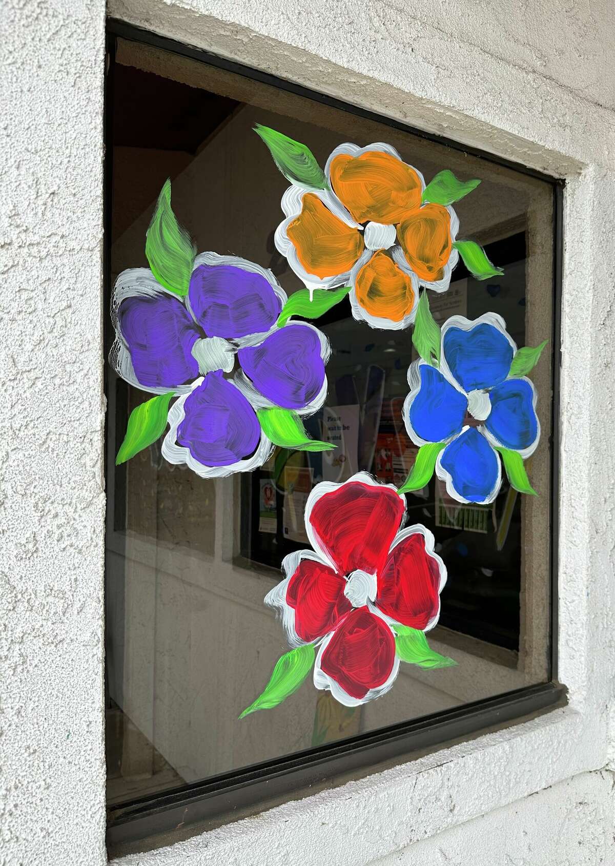 Fiesta window artist embodies puro San Antonio culture