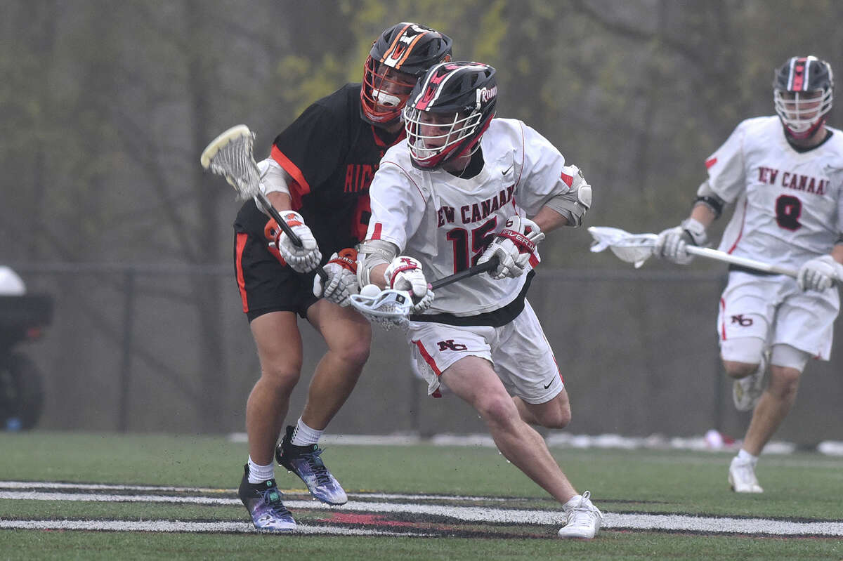 New Canaan boys lacrosse defeated Ridgefield at Dunning Field.
