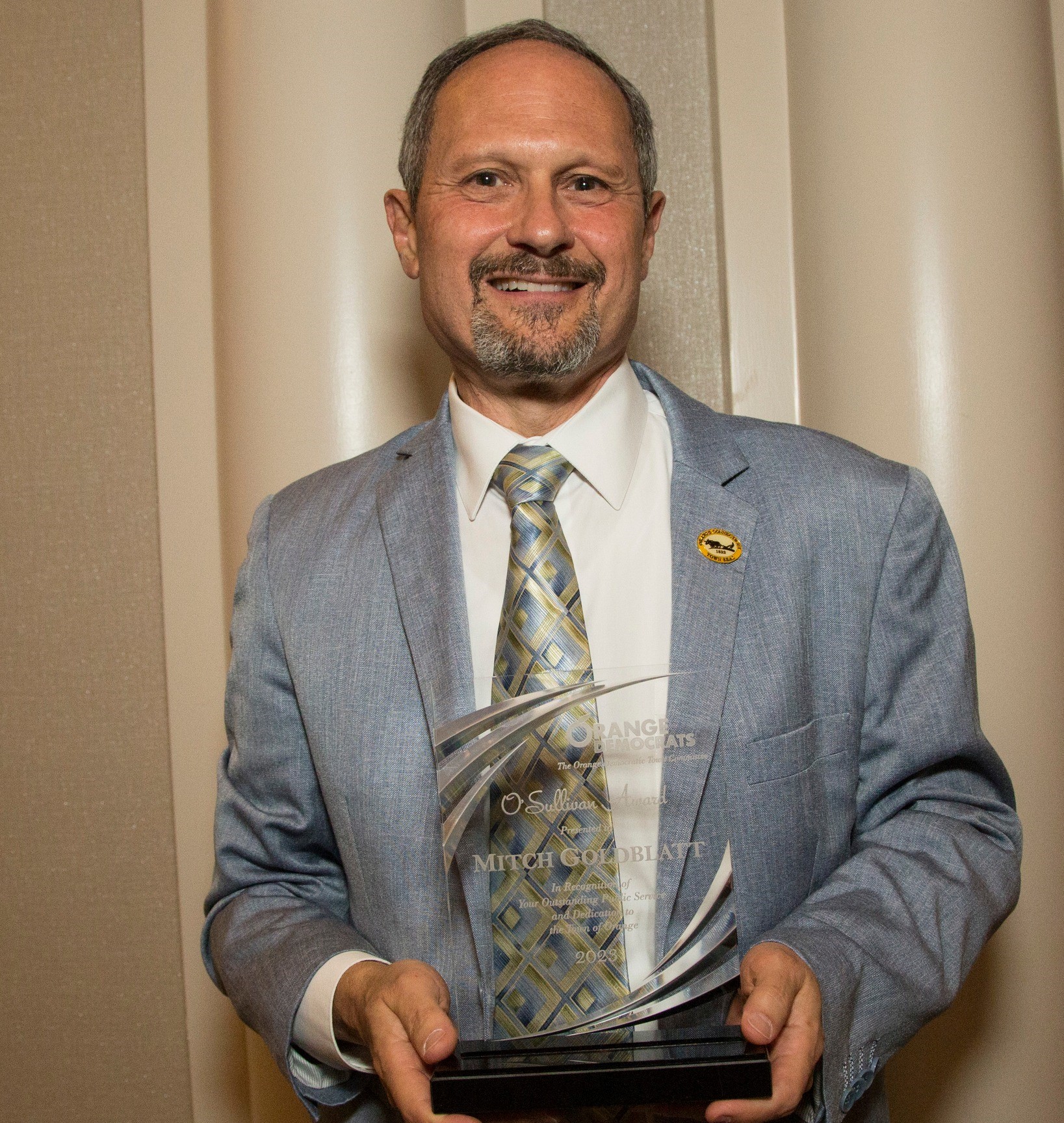 'Mr. Orange': Selectman recognized for 40-plus years of service