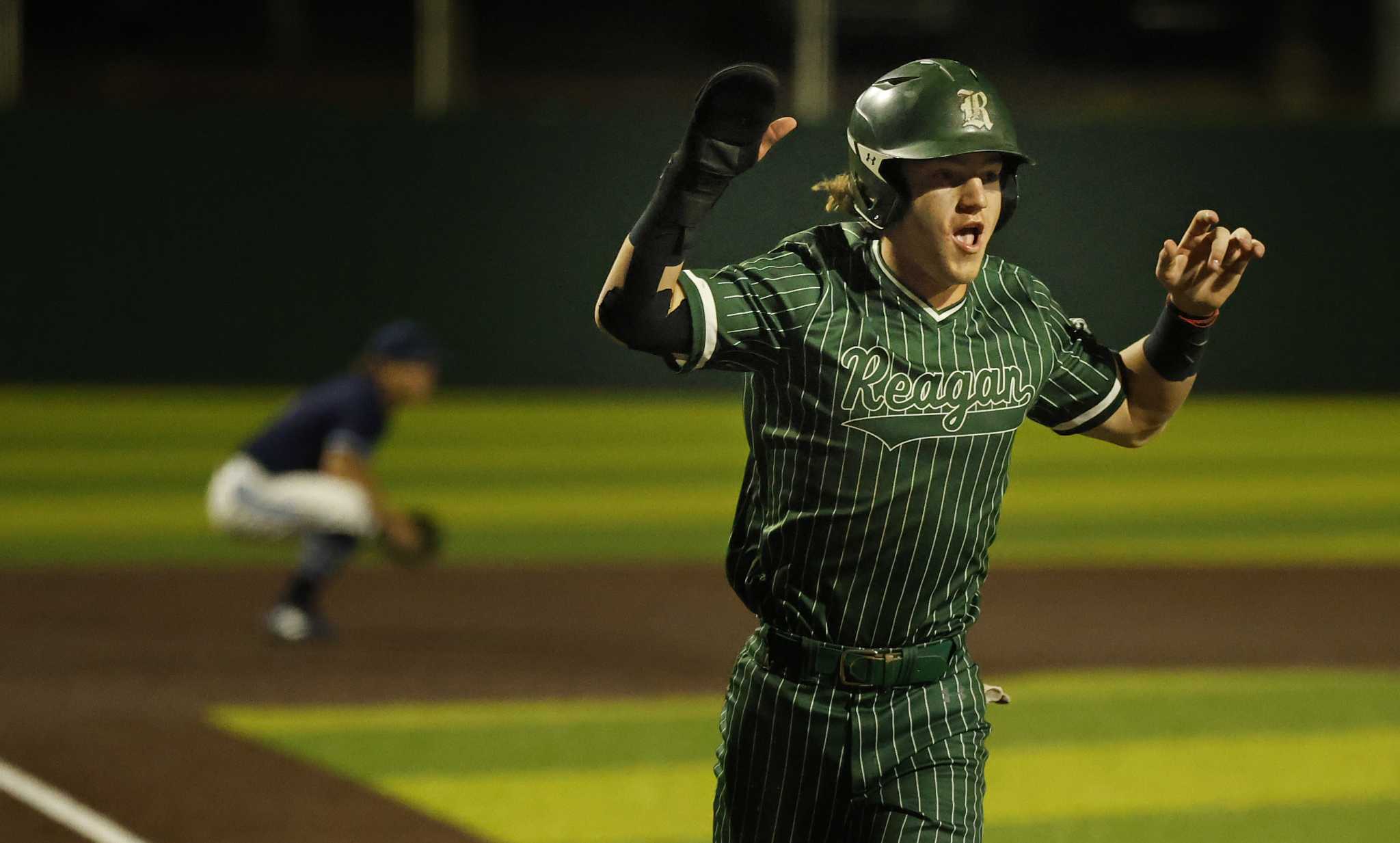 Reagan outlasts Johnson in extra innings
