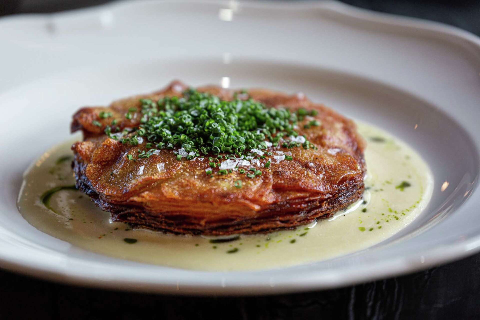 New upscale live-fire steakhouse Andiron opens today on Allen Parkway