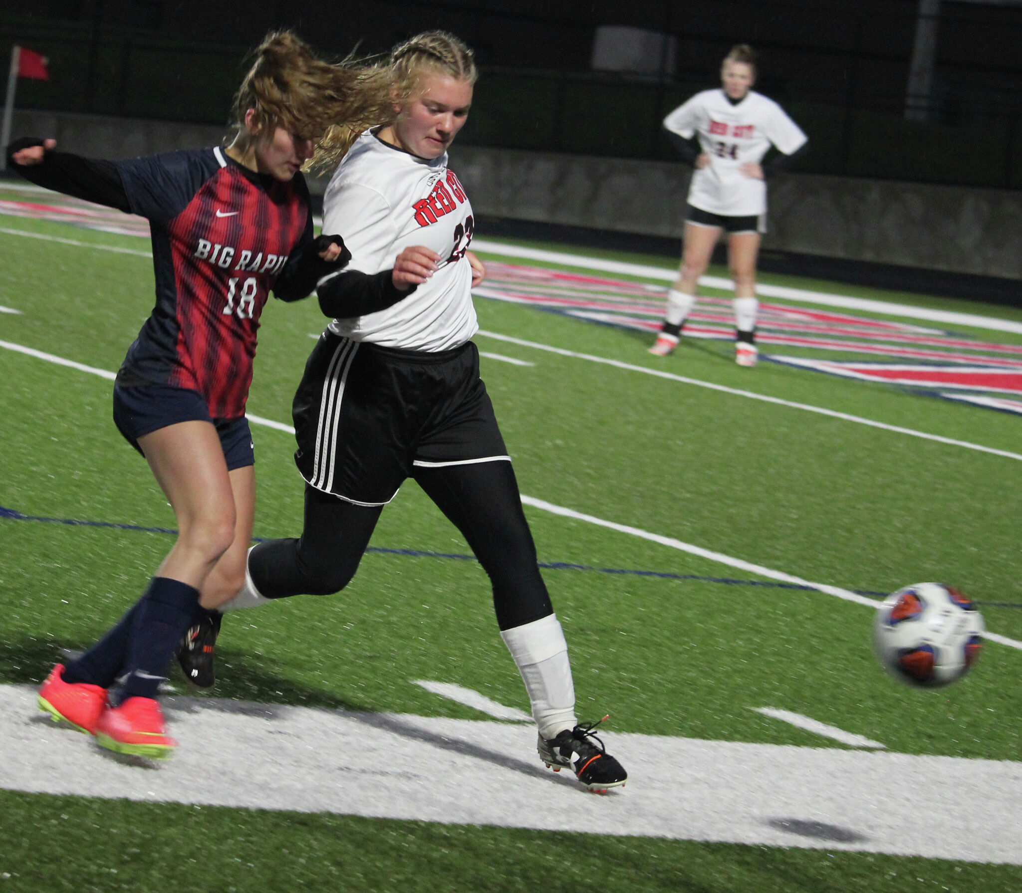 BR soccer girls overcome rain, storm and Reed City