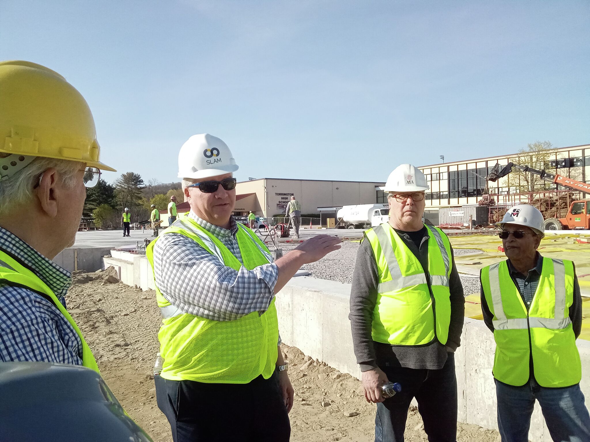 SLAM Collaborative, THS project architects, lead construction tour
